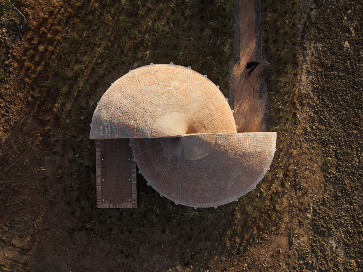 Twisted Brick Shell Concept Library | HCCH Studio - India Art N Design